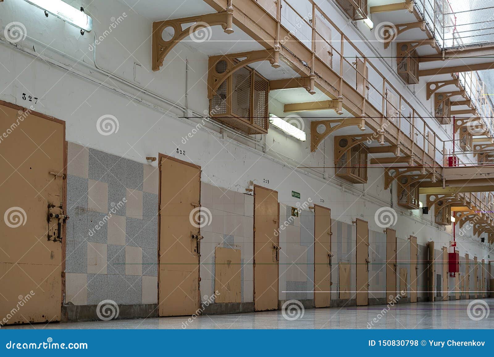 Doors of Prison Cells in the Corridor Stock Photo - Image of crime ...