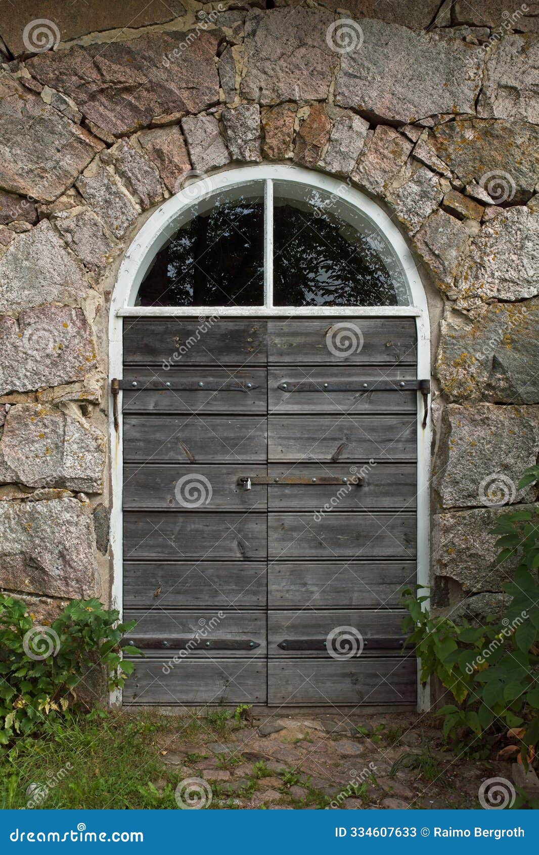 Doors on stone wall. stock image. Image of frame, building - 334607633