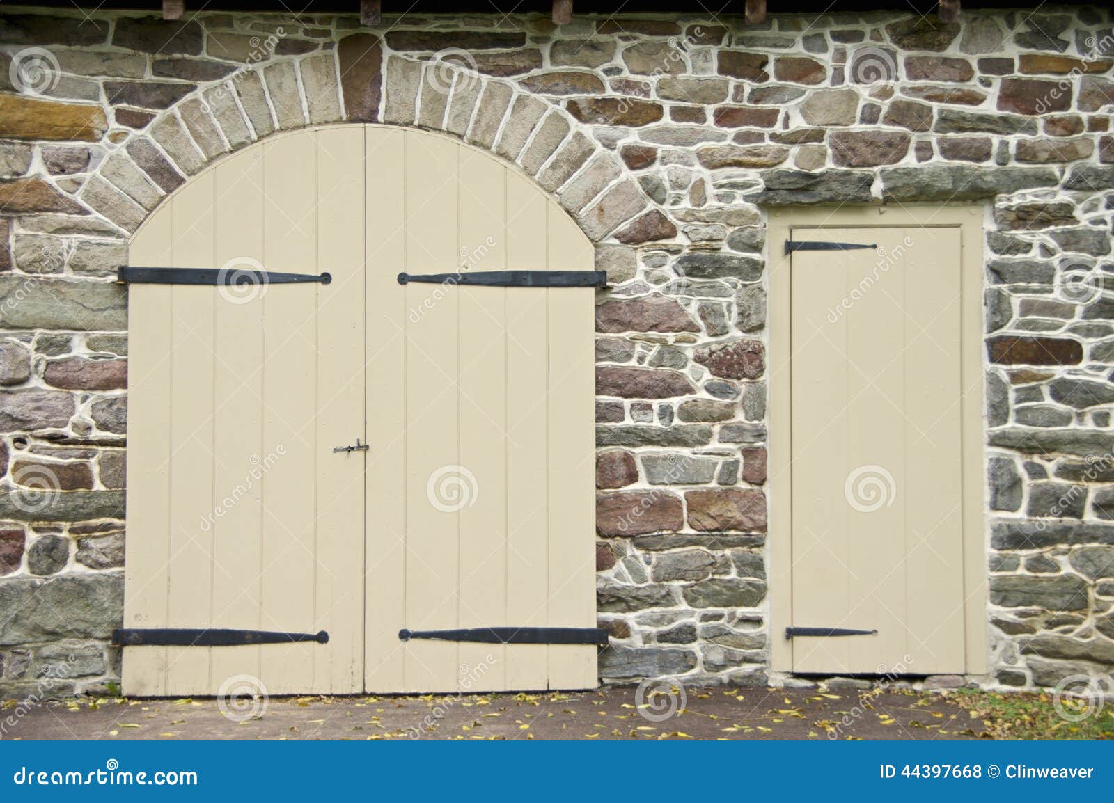 Doors in Stone Wall stock photo. Image of doors, latch - 44397668
