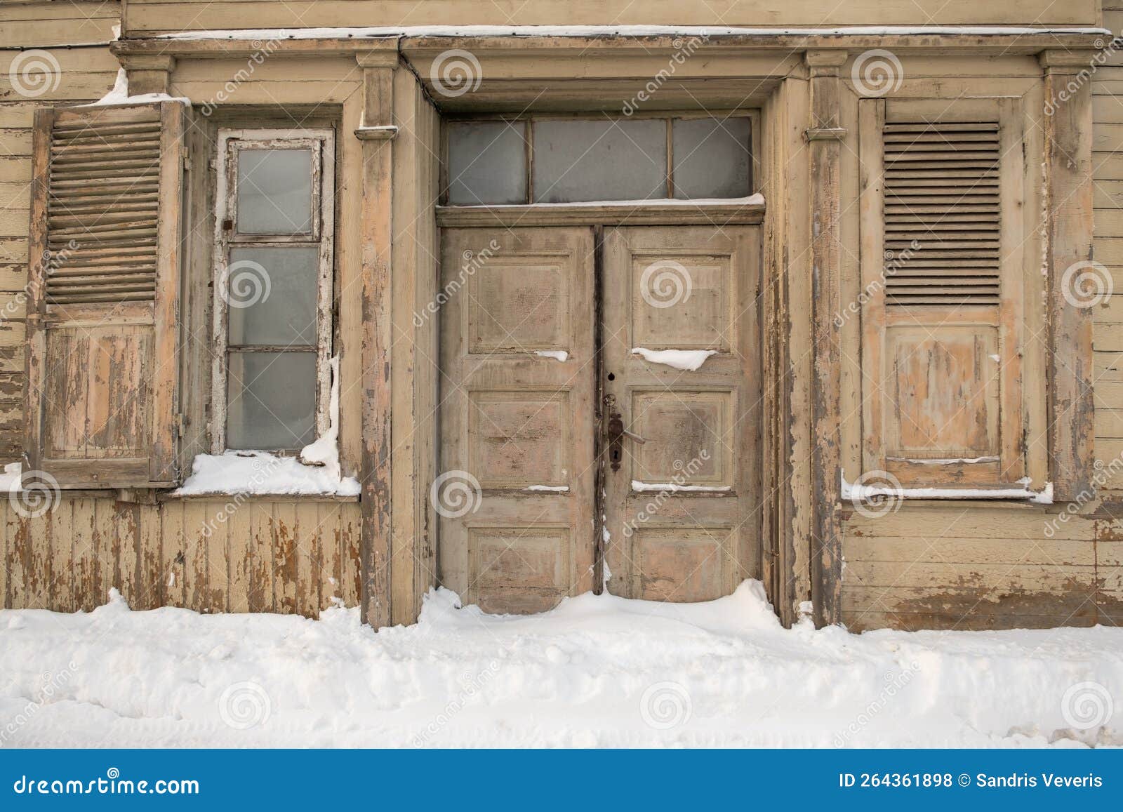 Doors and Windows of a Very Old House. Snow in Front of the House Stock ...