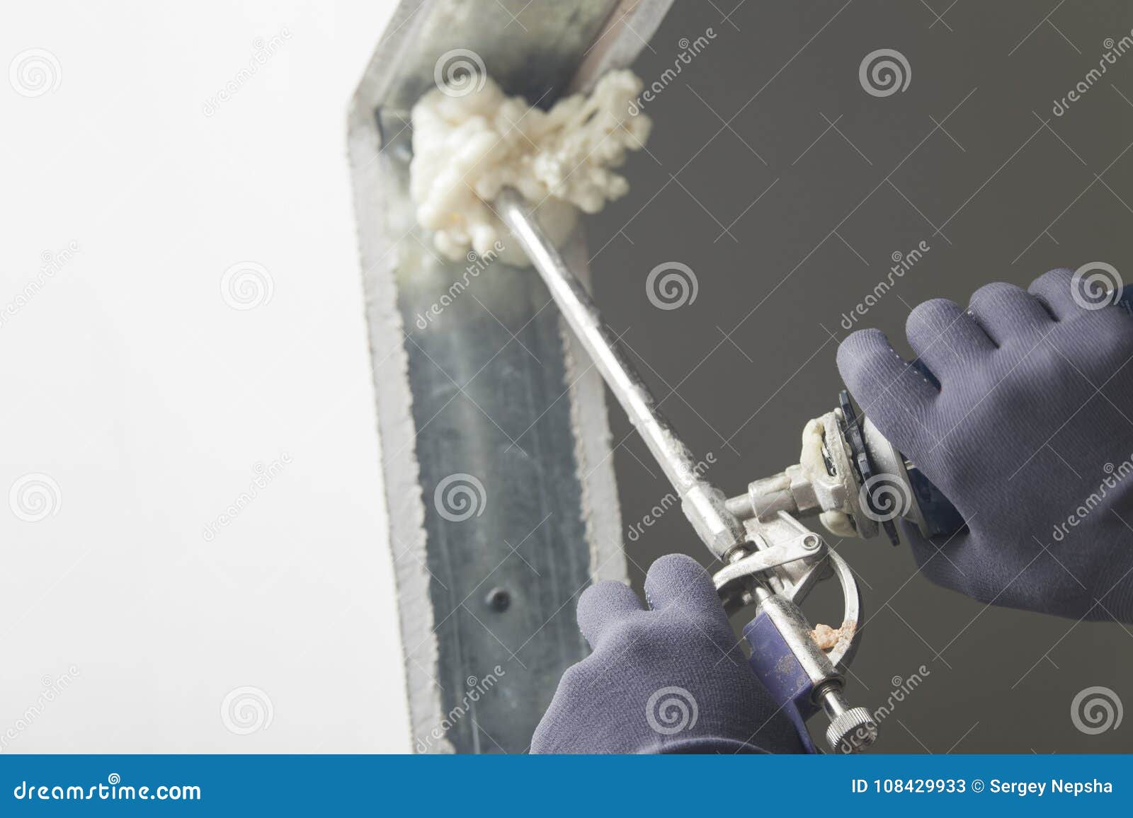 Doorway Fixing with Extending Foam Stock Image - Image of worker ...