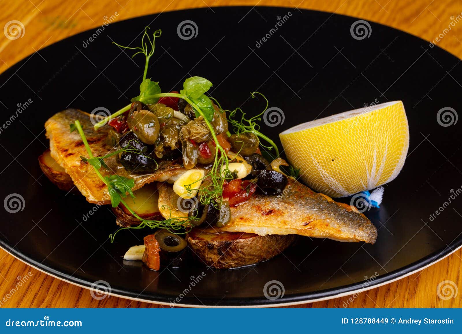 Dorada fillet with herbs stock image. Image of dish - 128788449