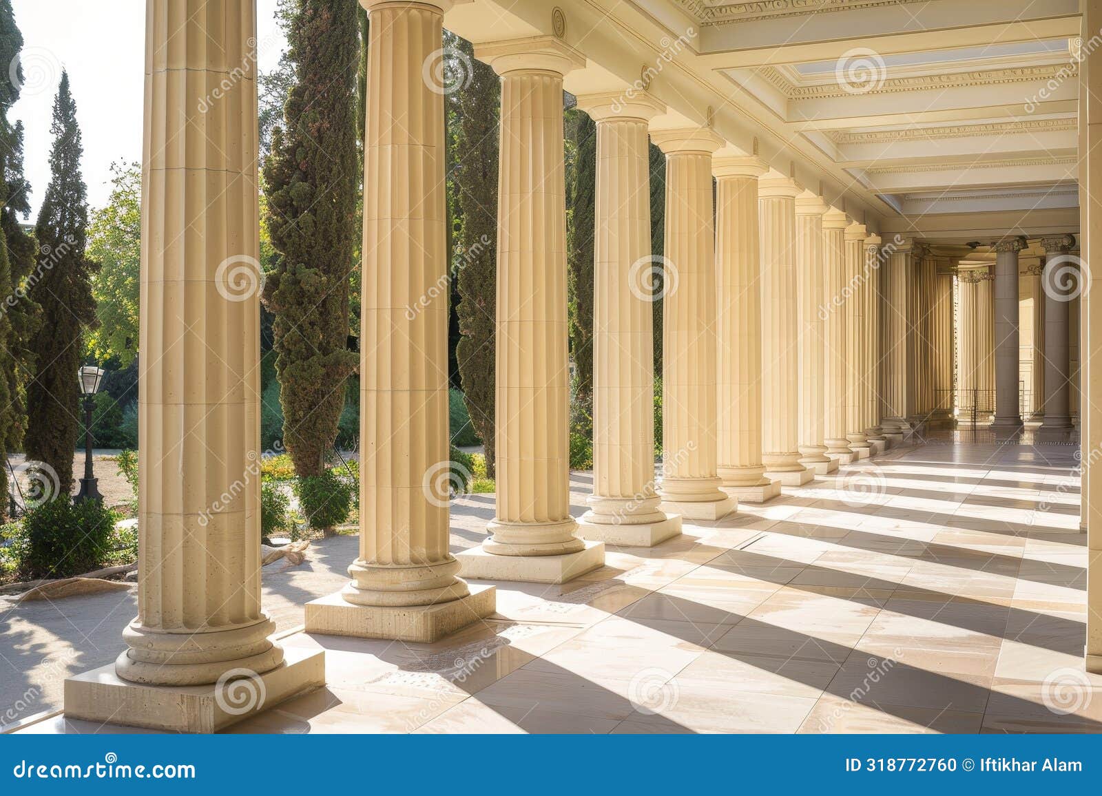 Doric Columns Standing in a Row, Framed by Trees in the Background of a ...