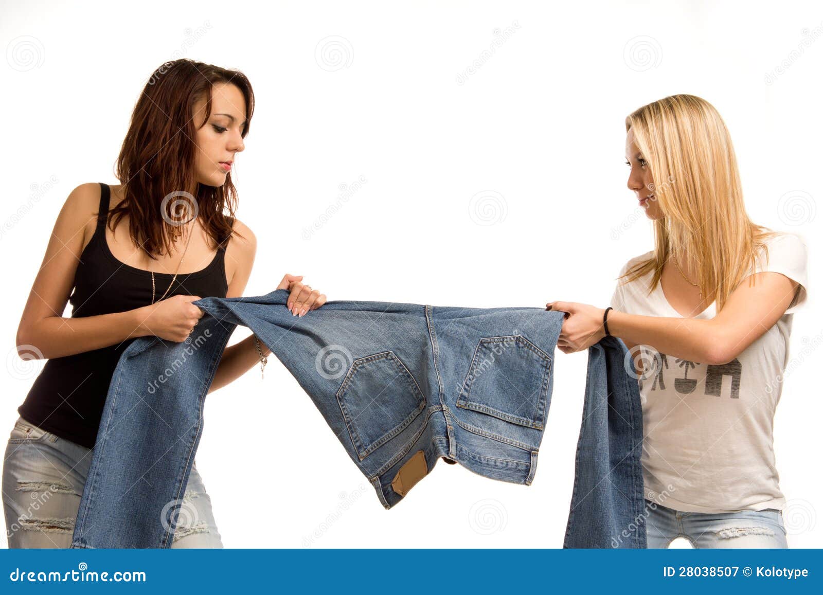 Dos Adolescentes Que Luchan Sobre Vaqueros Imagen de archivo - Imagen ...