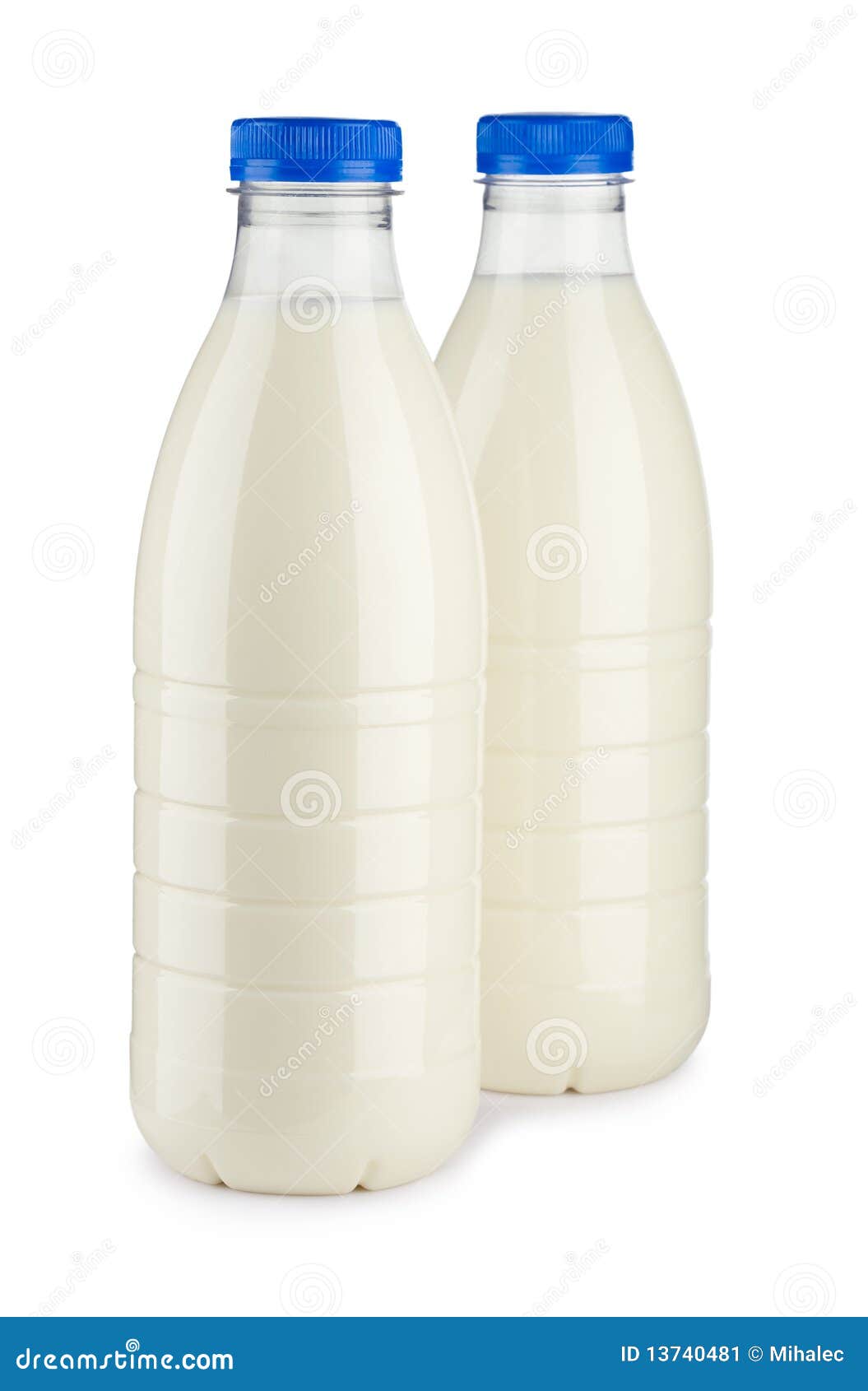 Dos botellas de leche imagen de archivo. Imagen de leche - 13740481