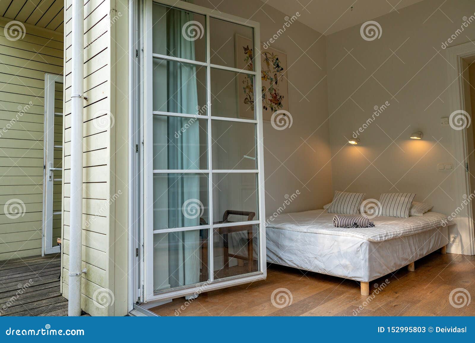 Double Bed with Doors Wide Open. Stock Image - Image of doors ...