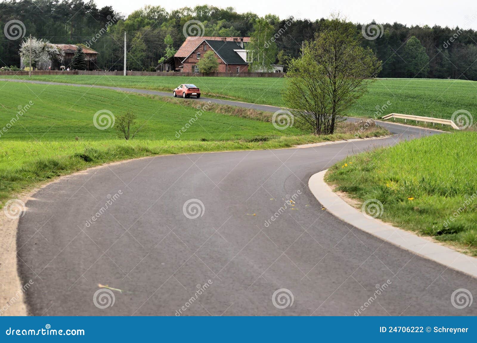 A Double Bend in the Road among Fields Stock Photo - Image of forest ...