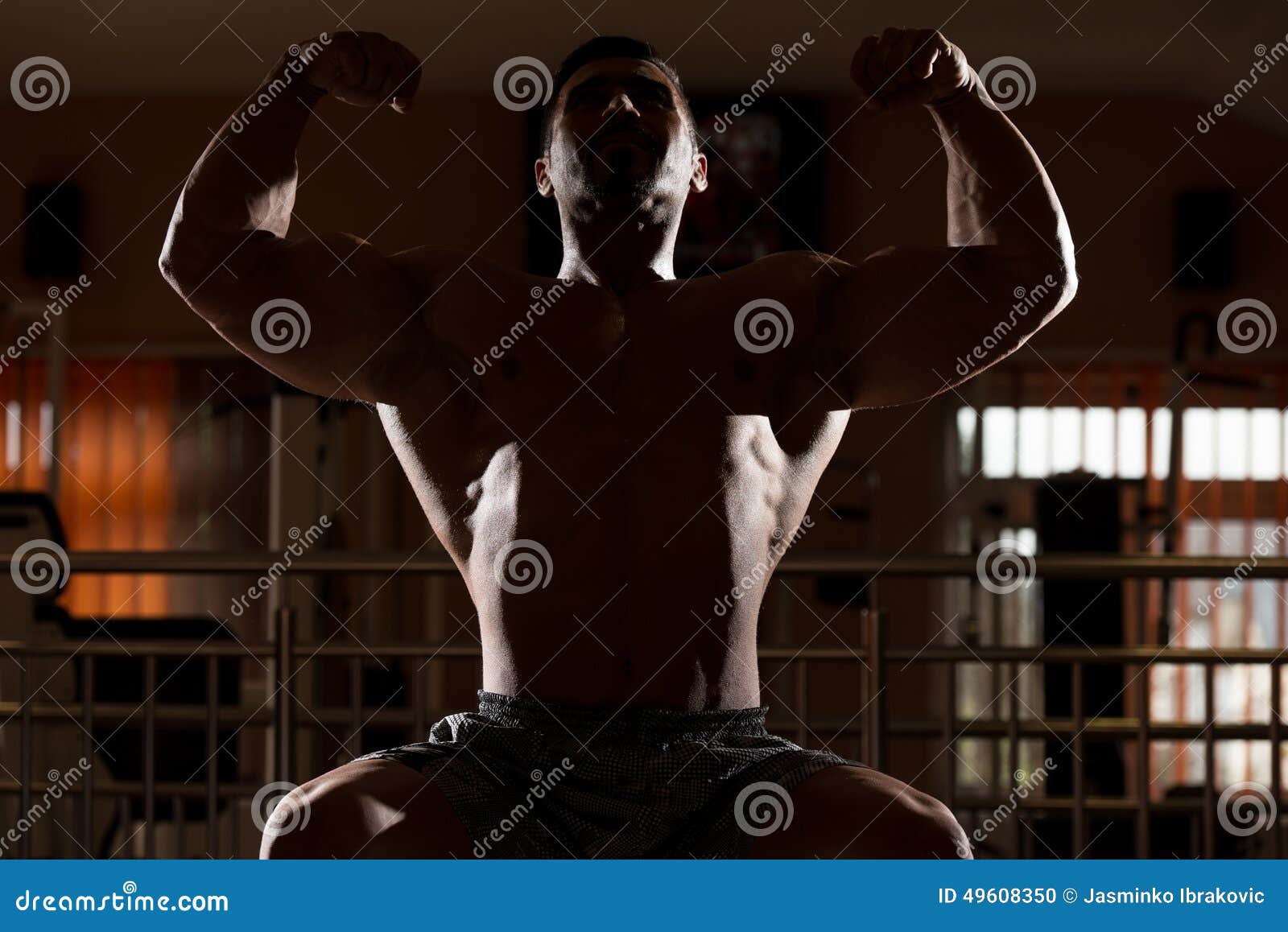 Double Biceps Pose stock photo. Image of exercise, building - 49608350