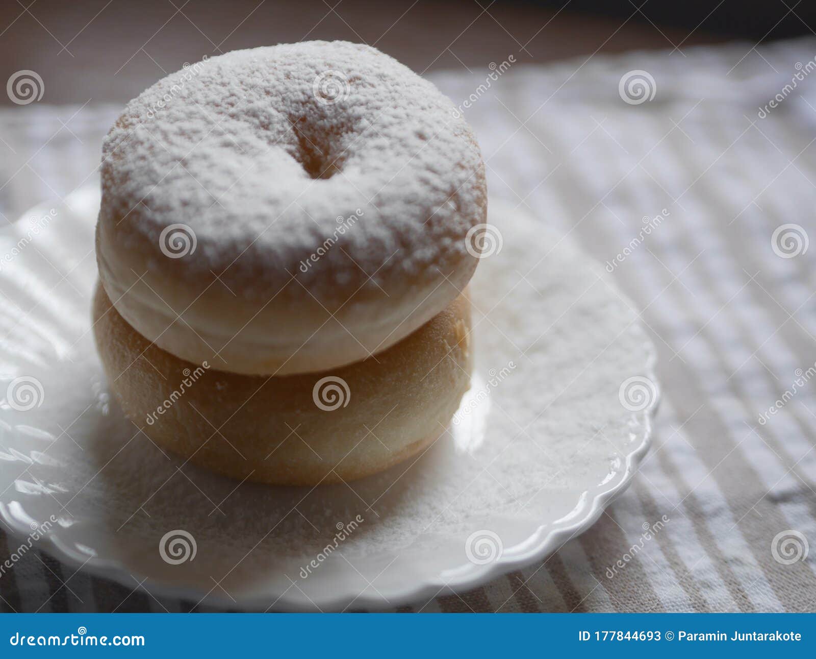 Double Brown Donuts with Icing Sugar Stock Image - Image of birthday ...