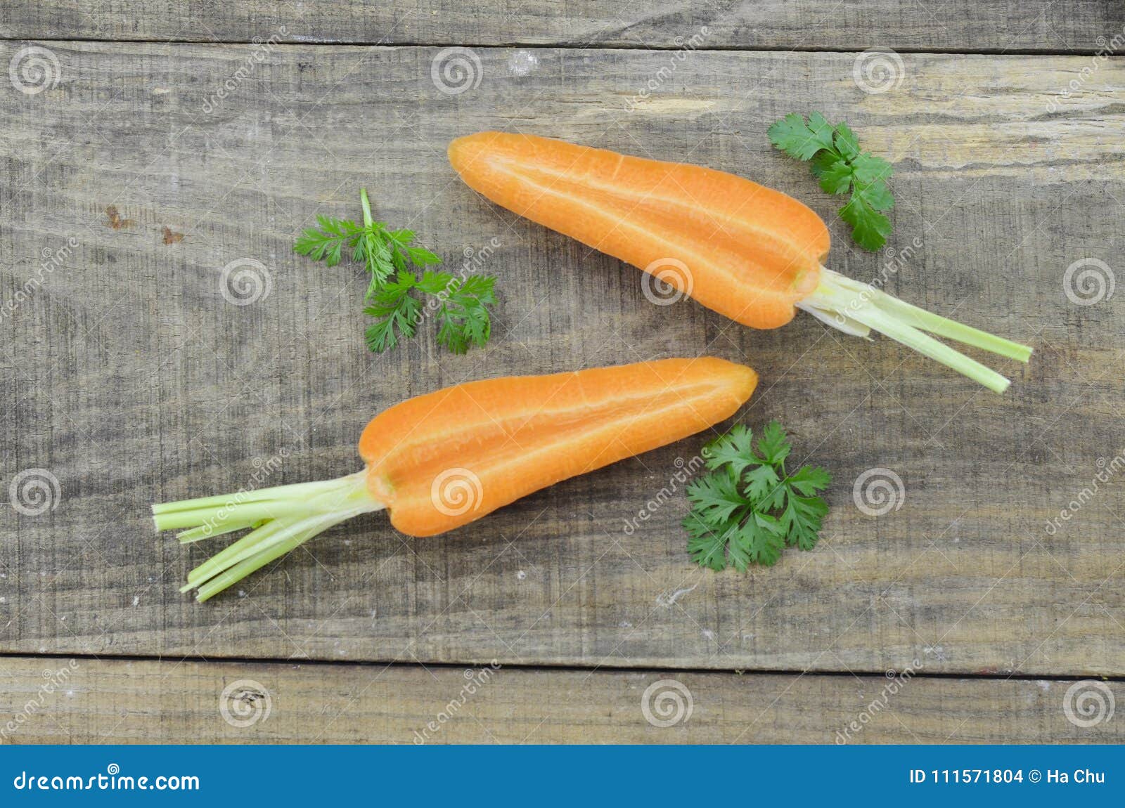 Double Cut Carrots on Wooden Background Stock Photo - Image of dietary ...