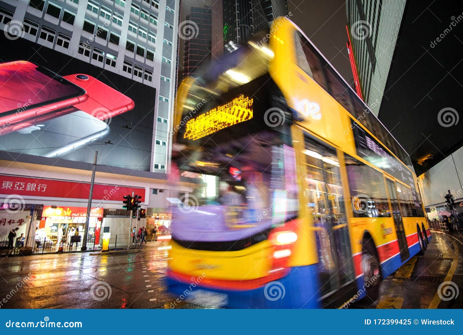 Double Decker Buses Drive on the Road of Causeway Bay on a Rainy ...
