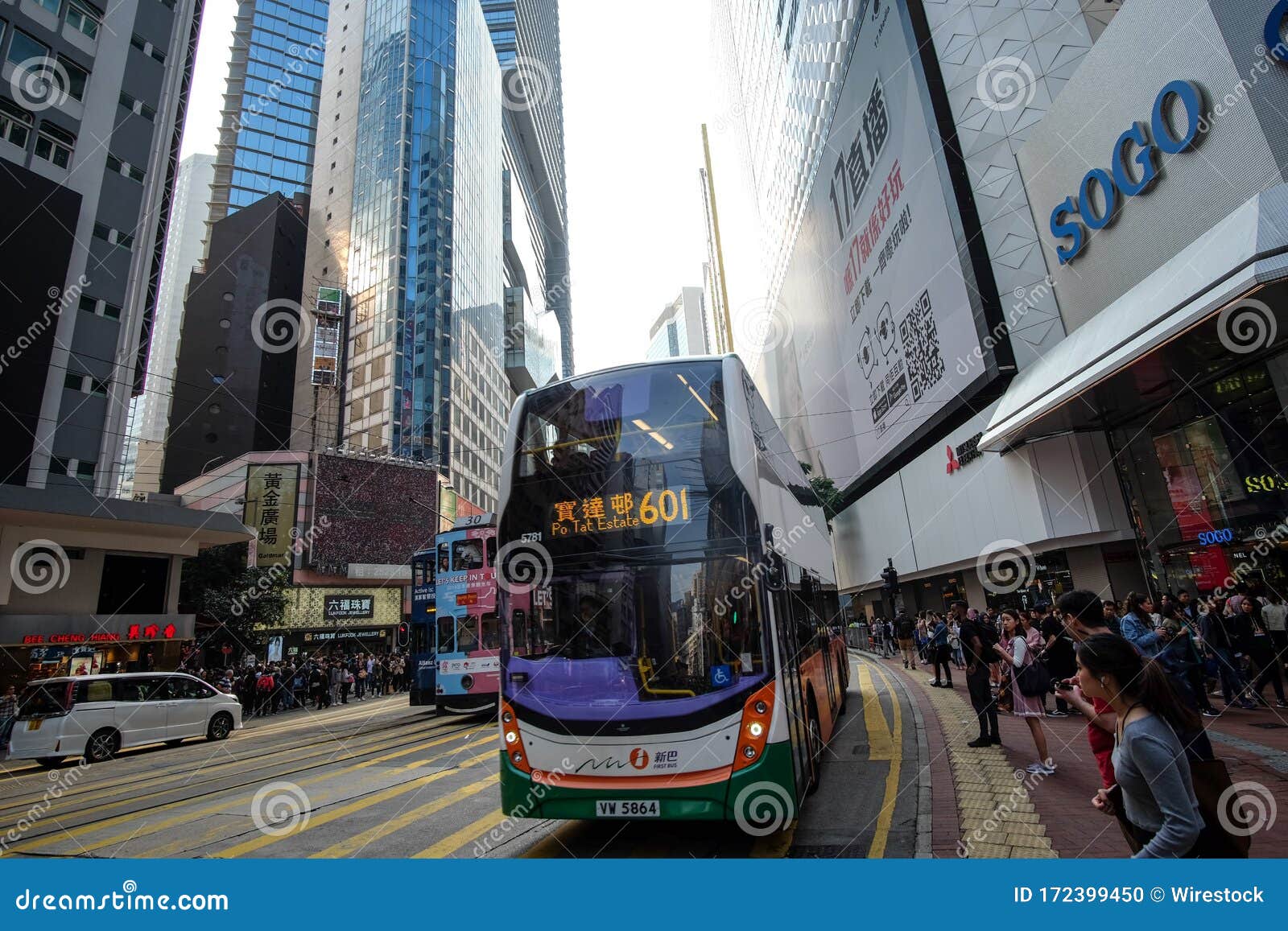 Double Decker Buses Drive on the Road of Causeway Bay on a Rainy ...