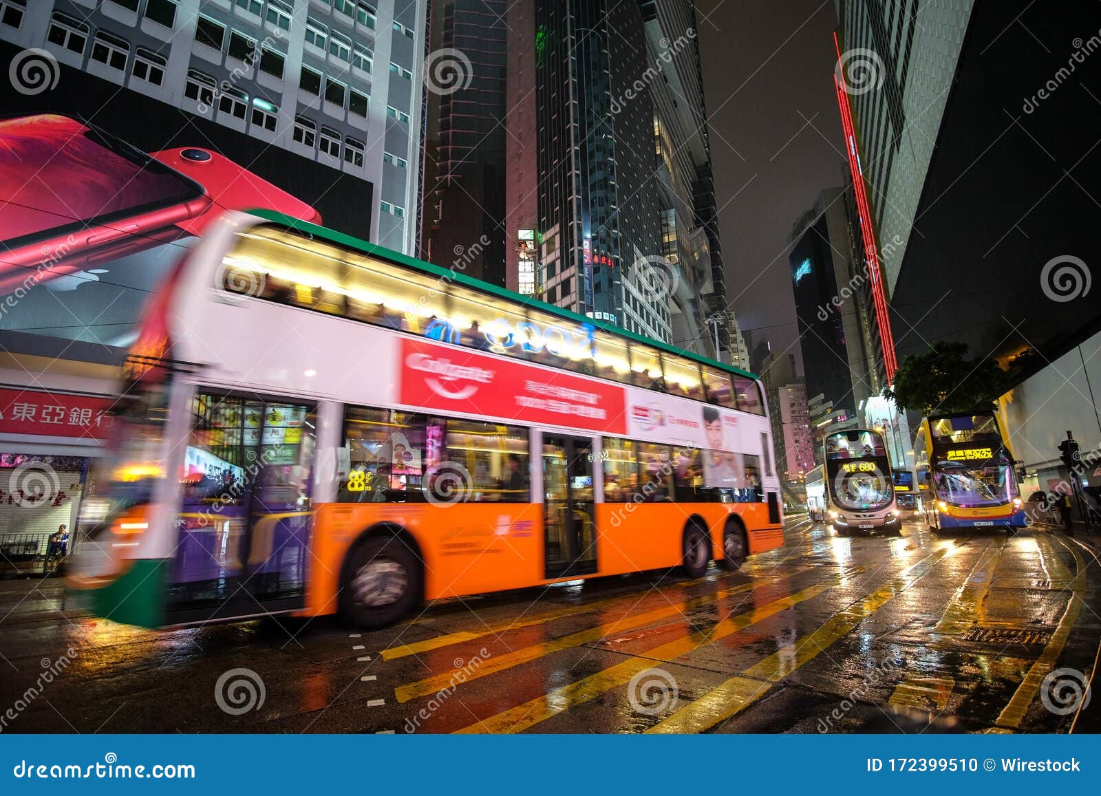 Double Decker Buses Drive on the Road of Causeway Bay on a Rainy ...