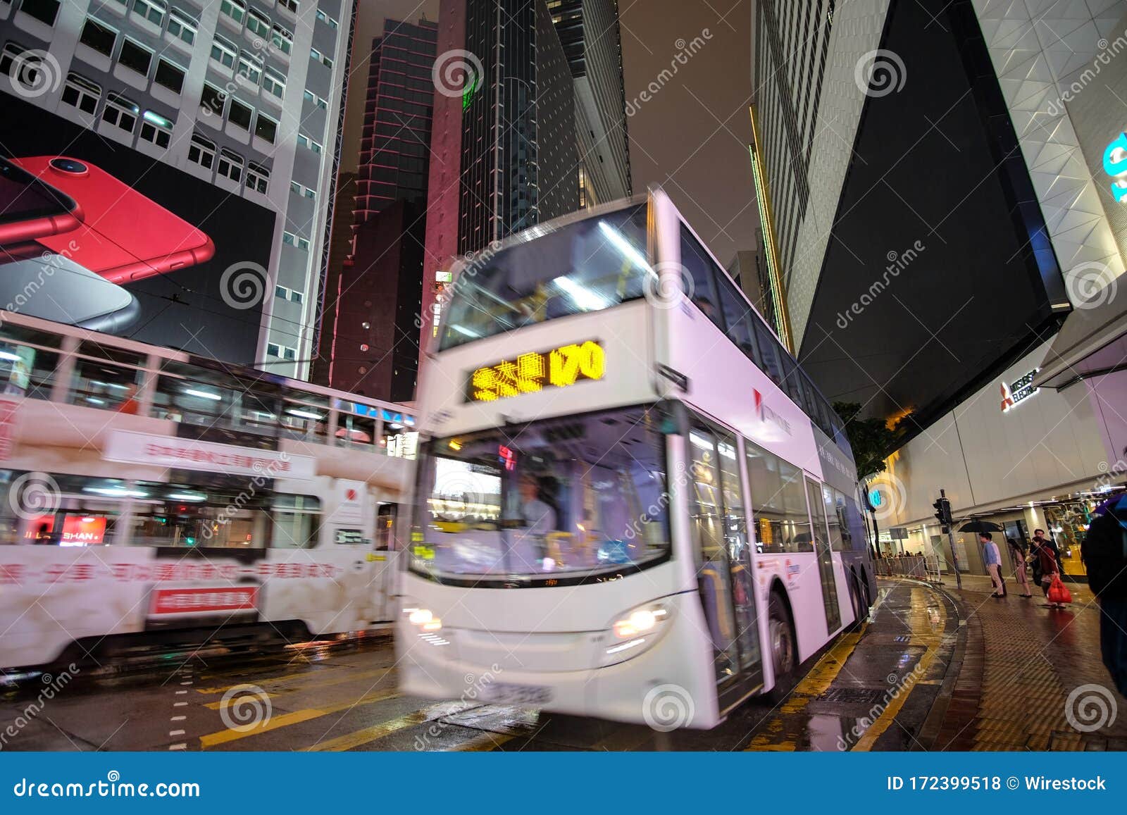 Double Decker Buses Drive on the Road of Causeway Bay on a Rainy ...