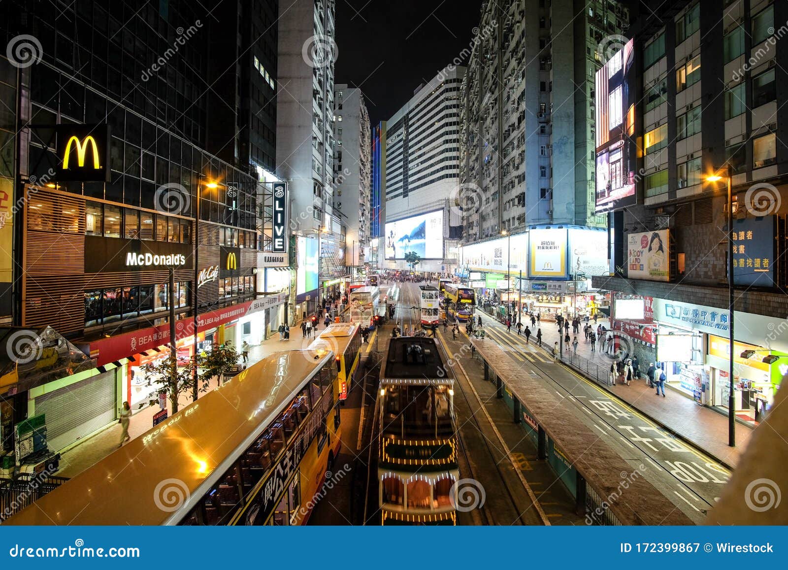 Double Decker Buses Drive on the Road of Causeway Bay on a Rainy ...