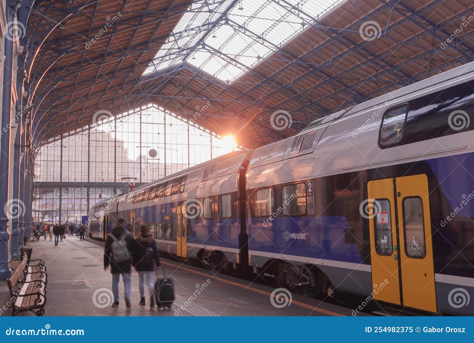 Double Decker Train at the Railway Station at Sunset Editorial Image ...