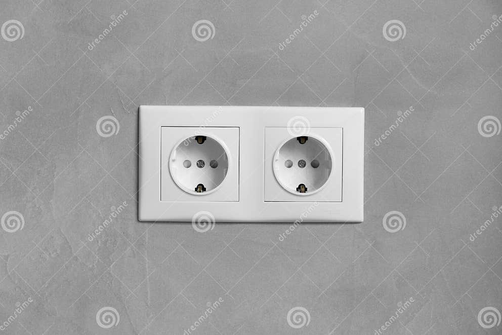 Double Electrical Outlet on a Gray Wall Copy Space Stock Photo - Image ...