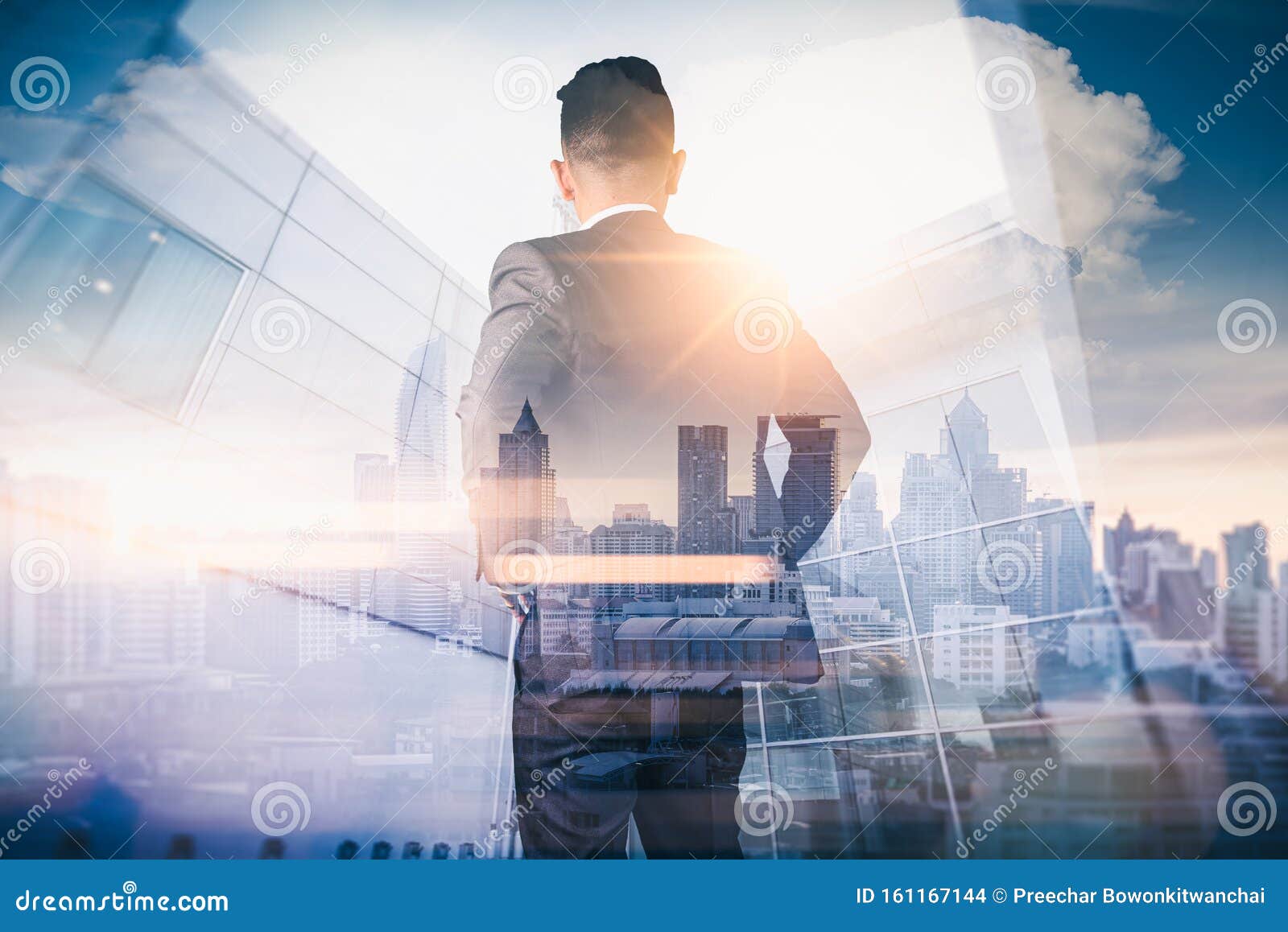 The Double Exposure Image Of The Businessman Standing Back During Sunrise Overlay With Cityscape
