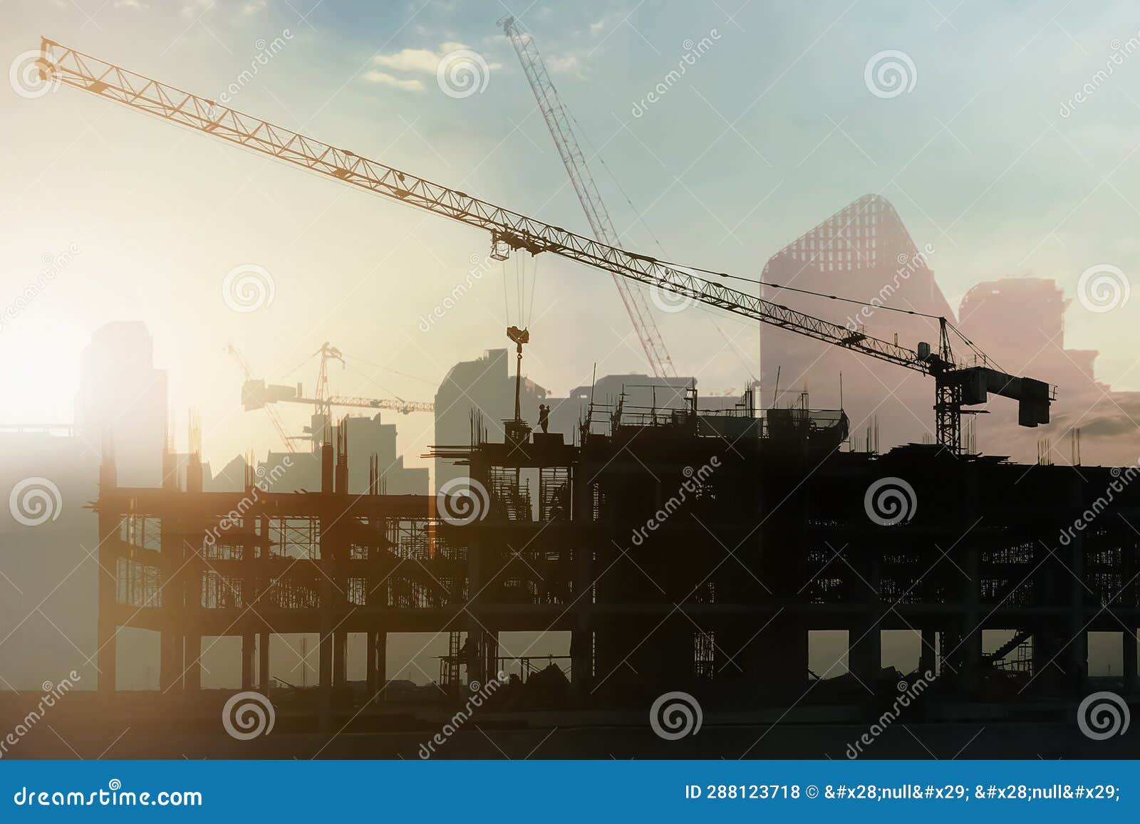 Double Exposure Image of Silhouette Building Construction Site with Tower Crane Working on ...