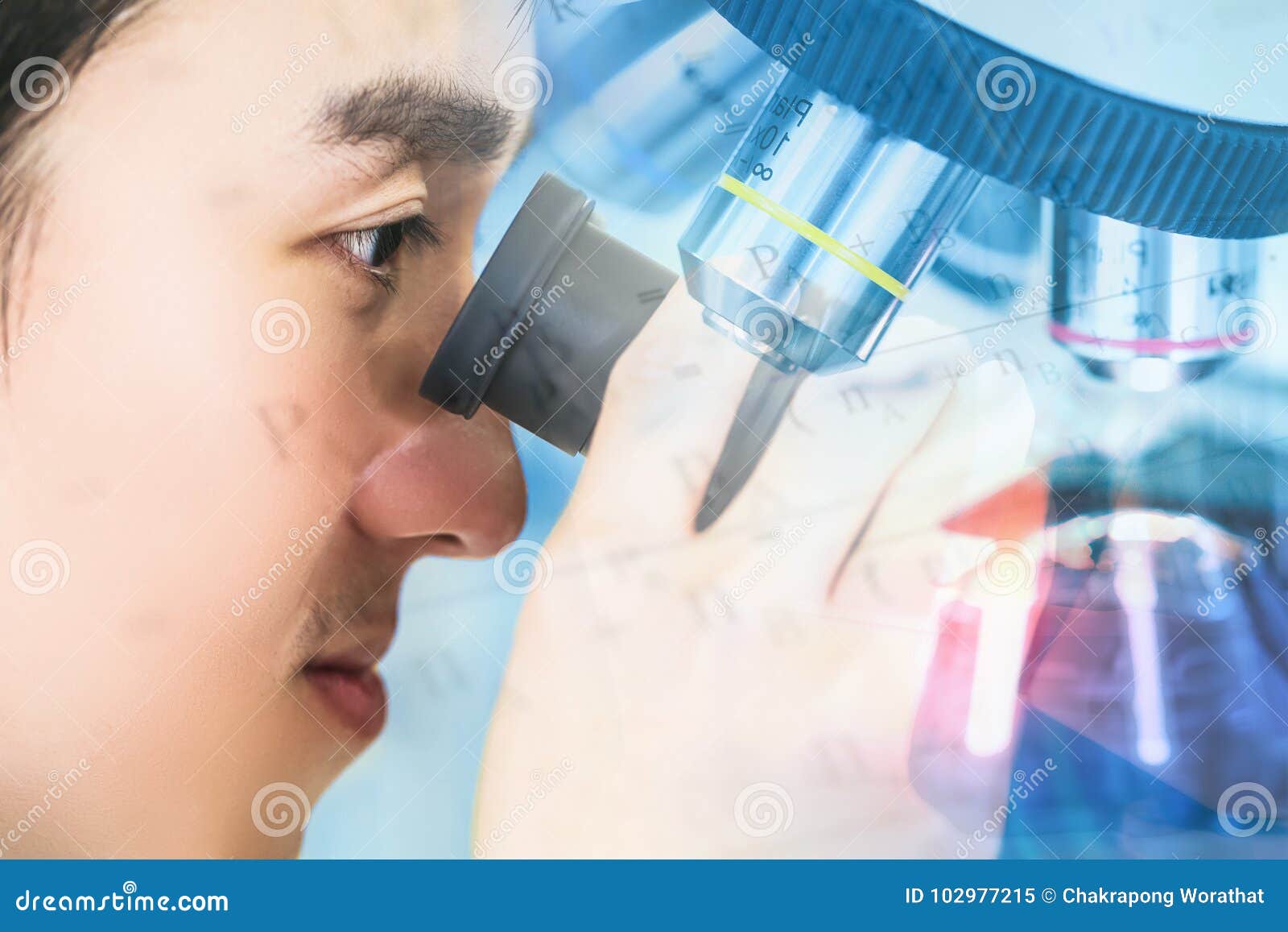 Double Exposure. Young Scientist Looking at Microscope in the La Stock ...