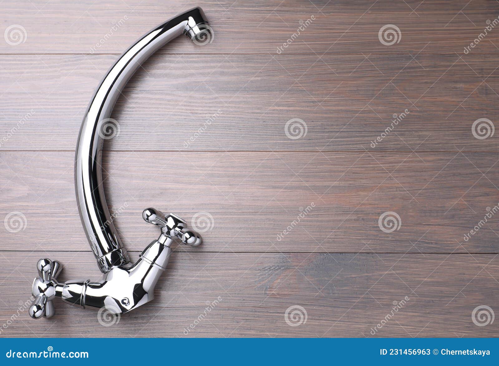 Double Handle Water Tap on Wooden Table, Top View. Space for Text Stock ...