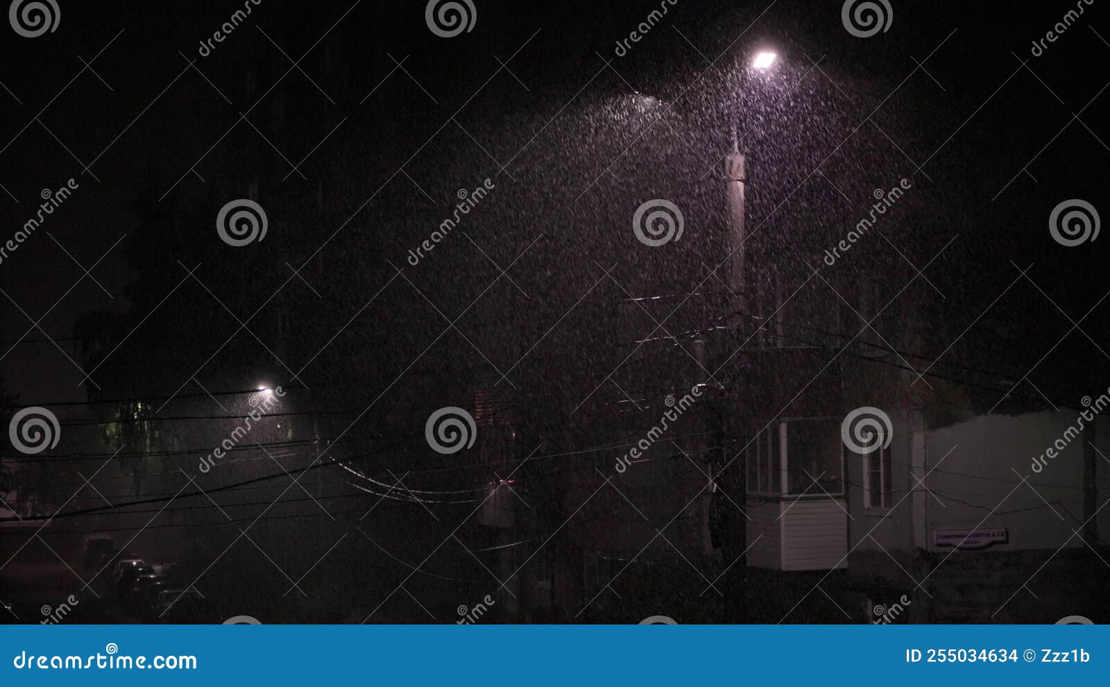 Double Led Panel Lamppost Under Heavy Rain at Night. Midsize View of Raindrops Against a ...