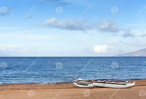 Double-outrigger Hawaiian Canoe Stock Photo - Image of plastic, sand ...