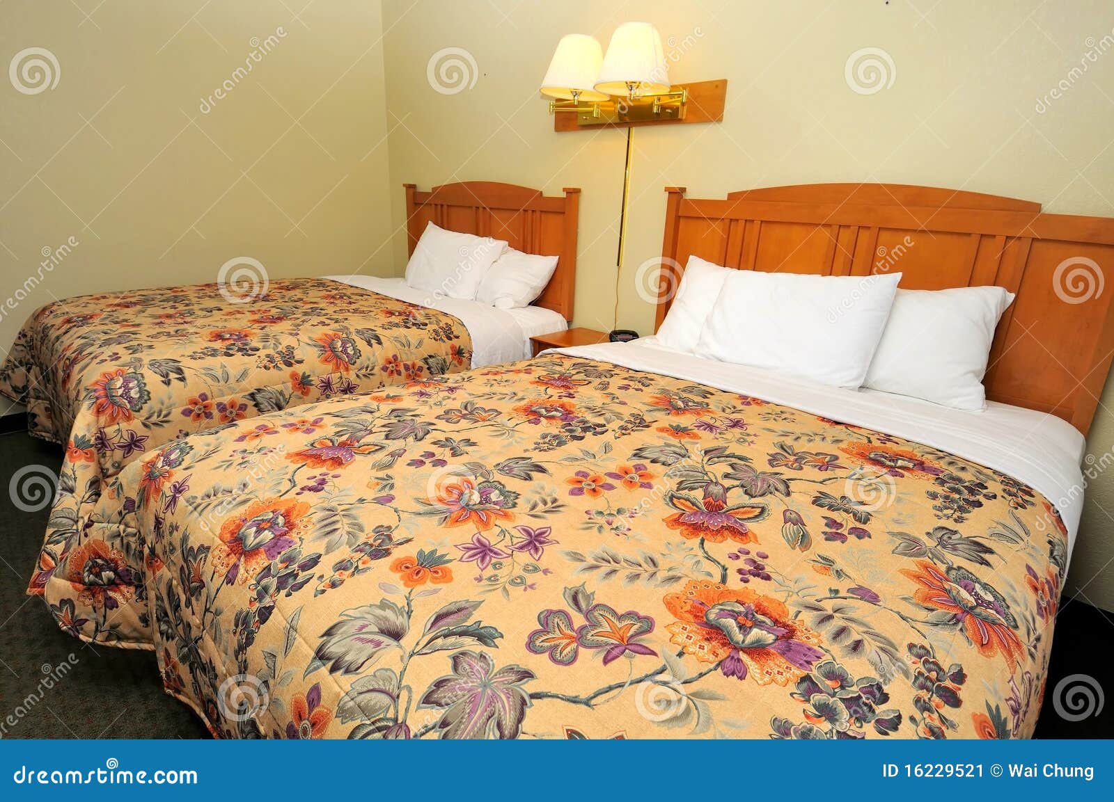 Double queen sized beds stock image. Image of indoors - 16229521