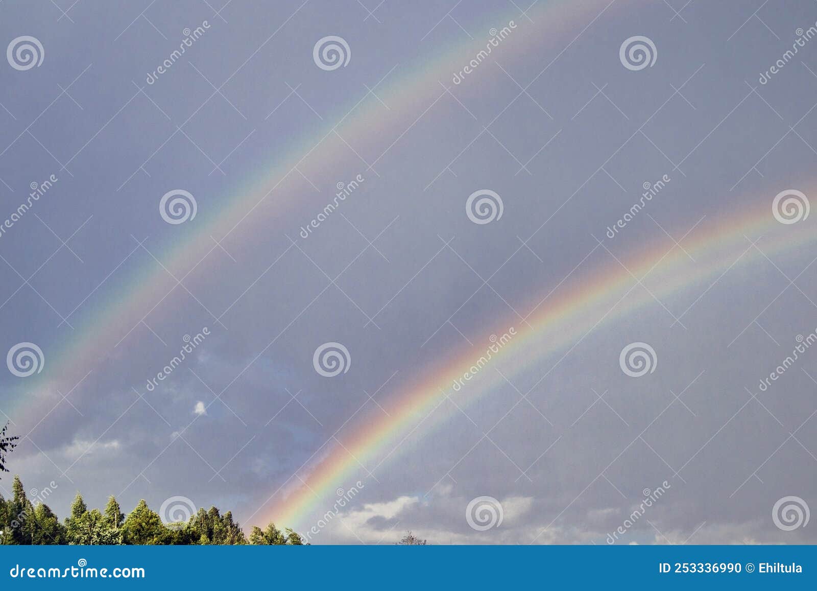 Double Rainbow in a Cloudy Sky after Rain Stock Photo - Image of storm ...