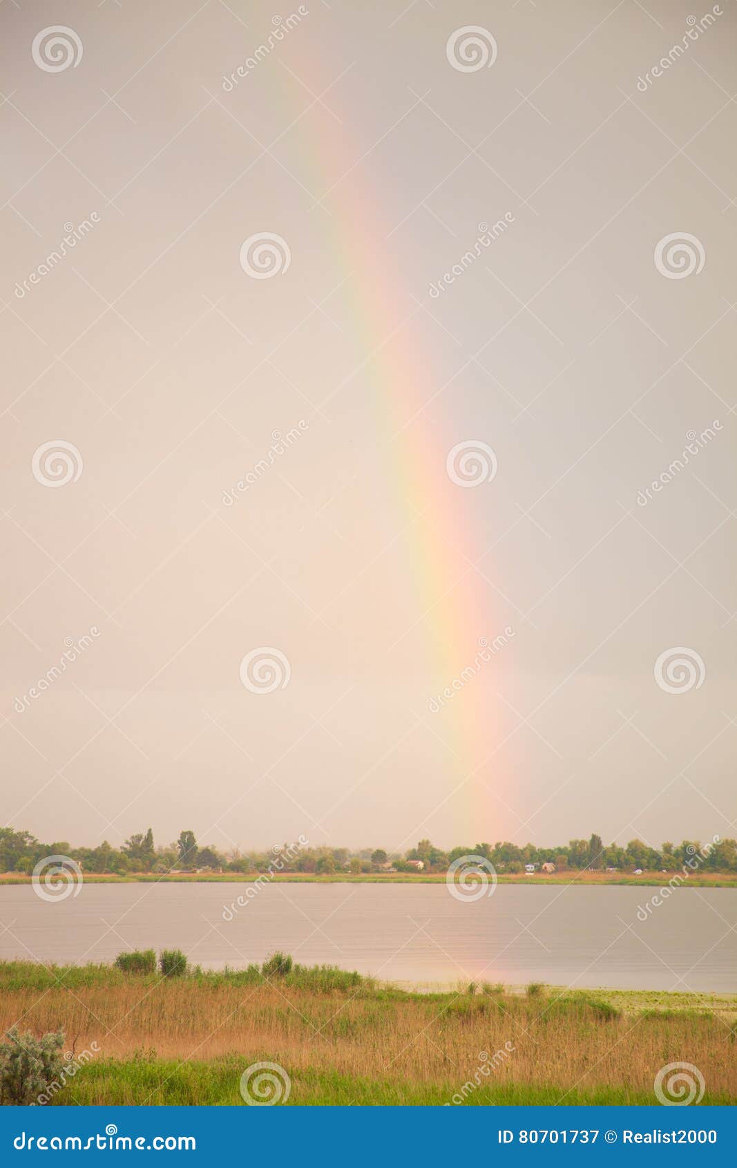 Double rainbow over a lake stock image. Image of rainbow - 80701737