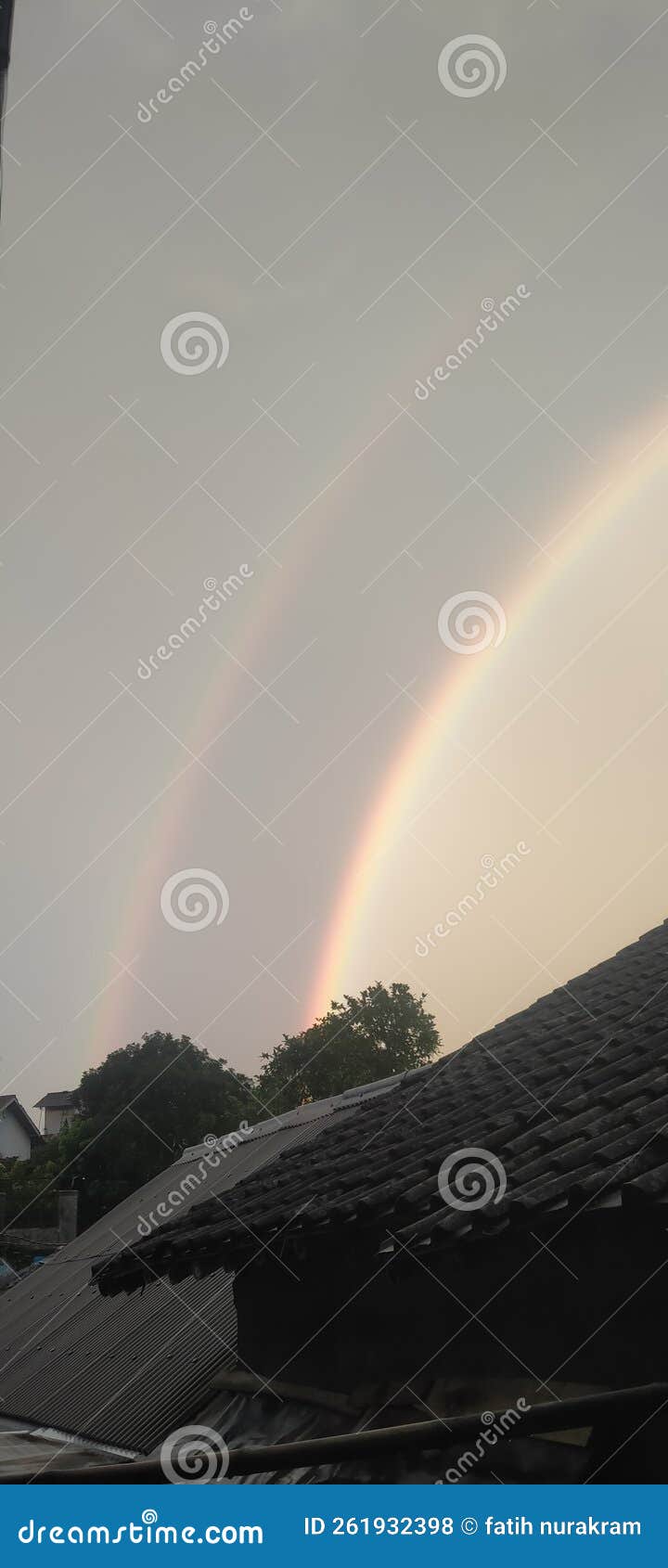 Double Rainbow after rain stock photo. Image of rain - 261932398