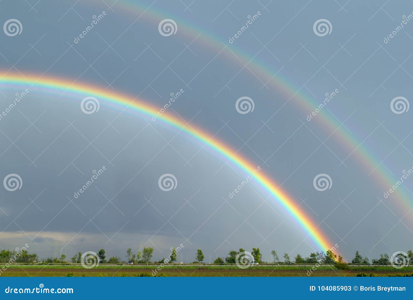 Double rainbow in the sky stock image. Image of double - 104085903