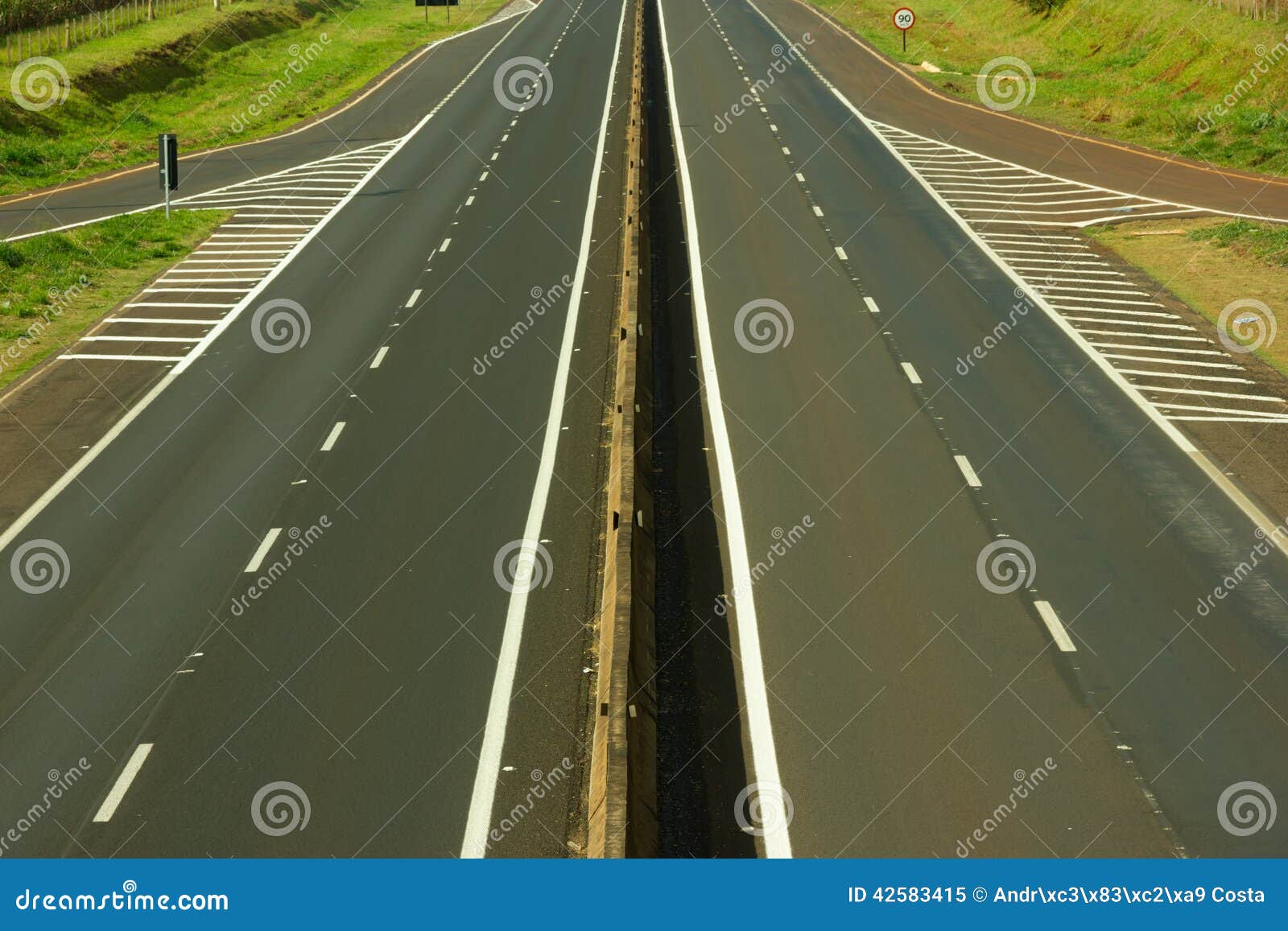 Double Road with Crossroad and Signs Stock Image - Image of highway ...