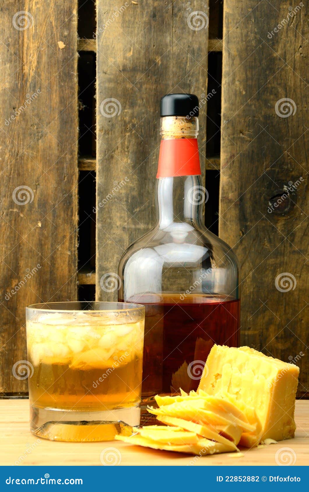 Double on the Rocks with Cheese Stock Photo - Image of bottle, alcohol ...