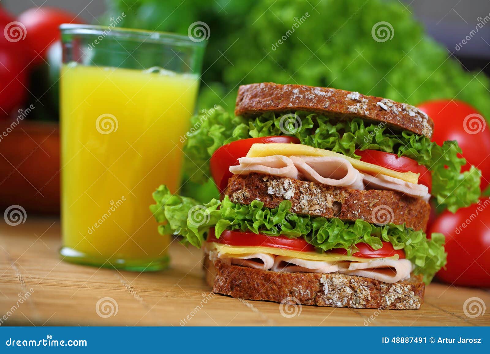 Double Sandwich With Ham, Cheese, Lettuce, Tomato And Green Olives ...
