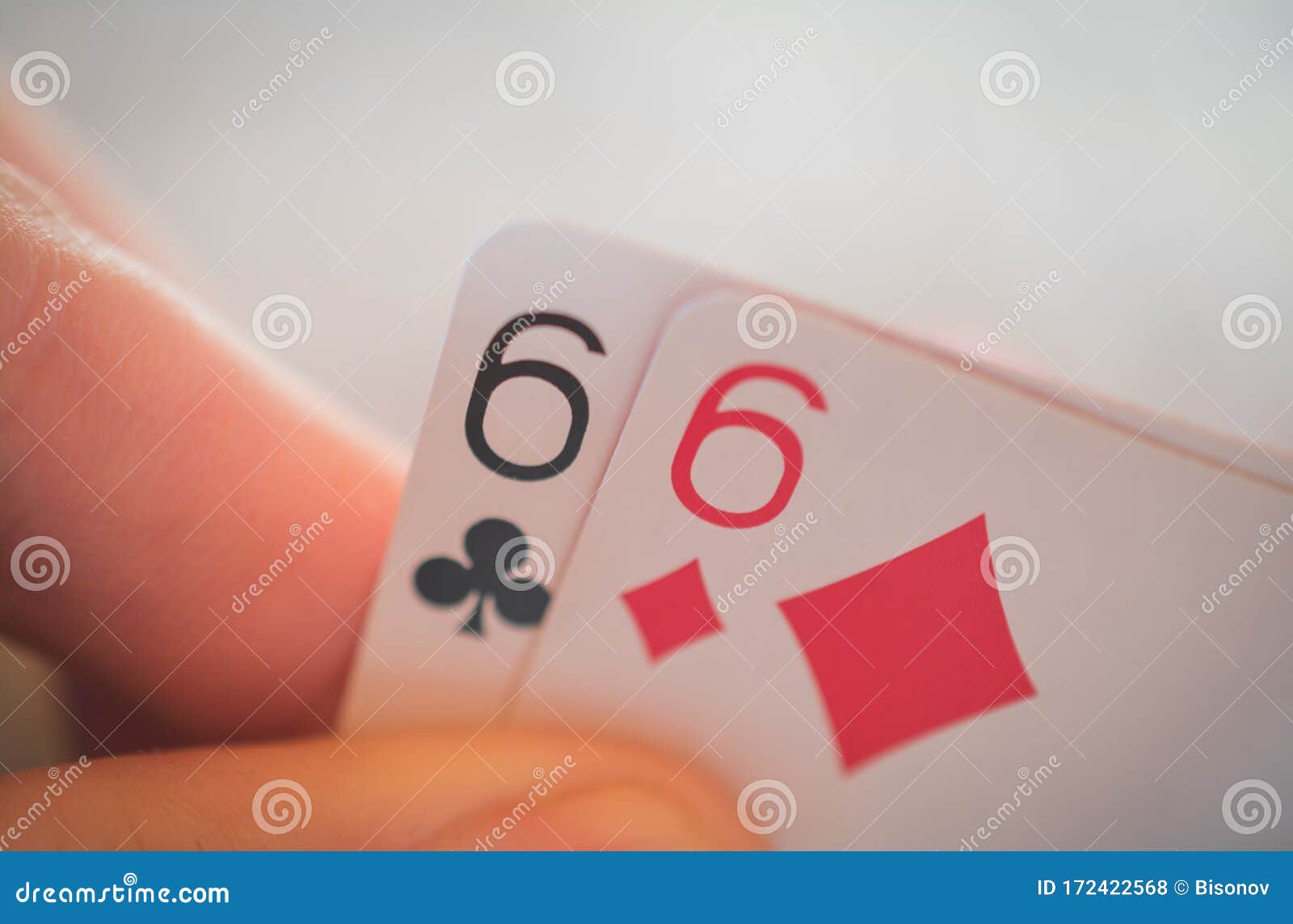 Double Six, Playing Cards in Hand on the Table, Poker Nands Stock Photo ...