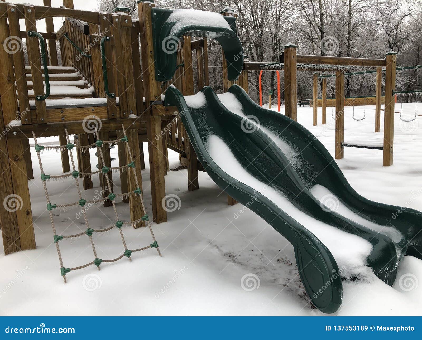 Ice Covered Sliding Board in Playground Stock Image - Image of ...