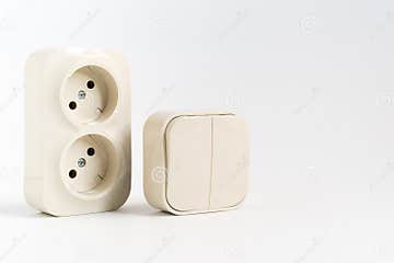 Double Socket and Two-key Light Switch on White Background. Editorial ...