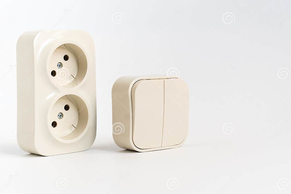 Double Socket and Two-key Light Switch on White Background. Stock Photo ...