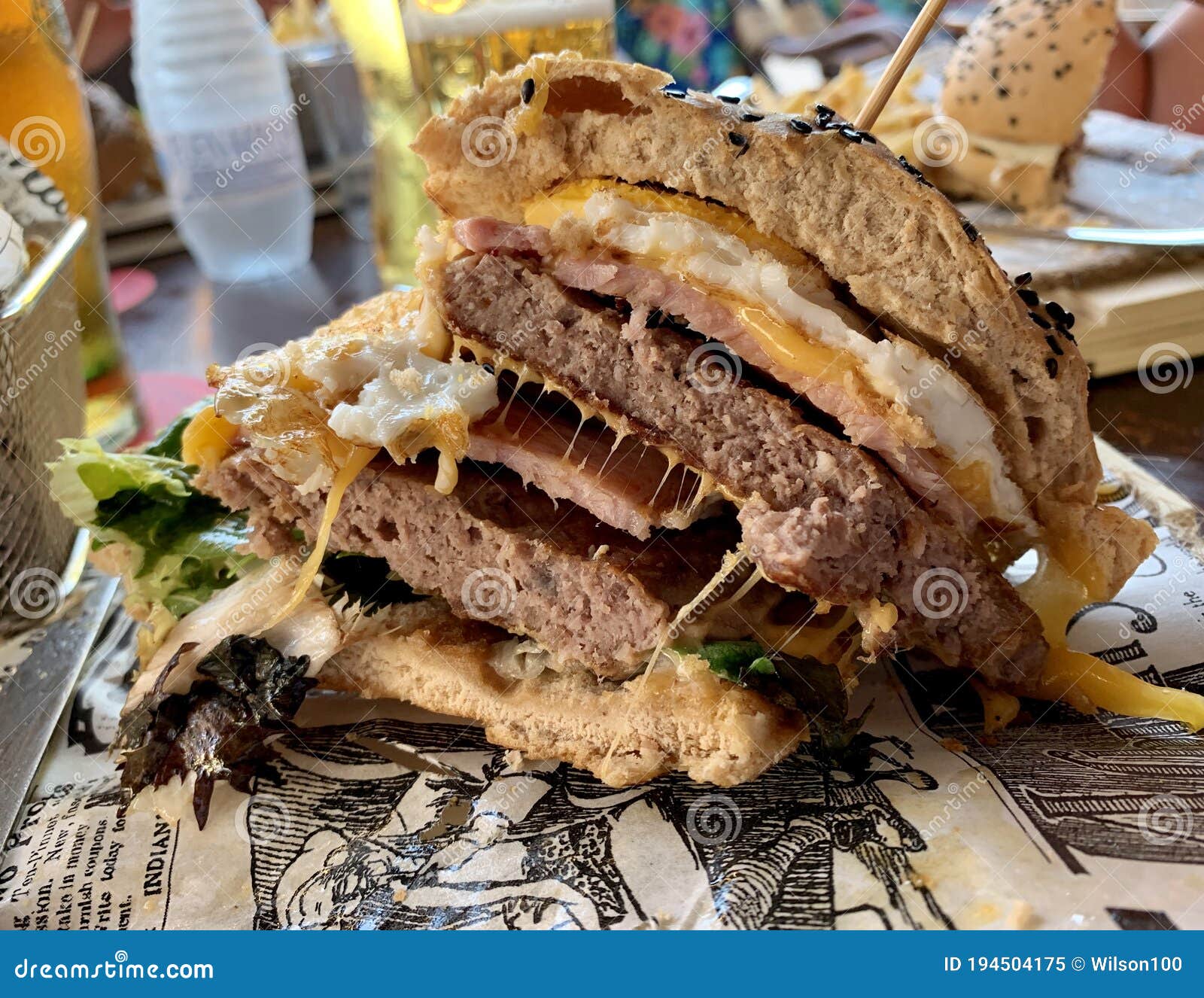 A Double Stacked Cheese and Bacon Burger Stock Image - Image of runny ...