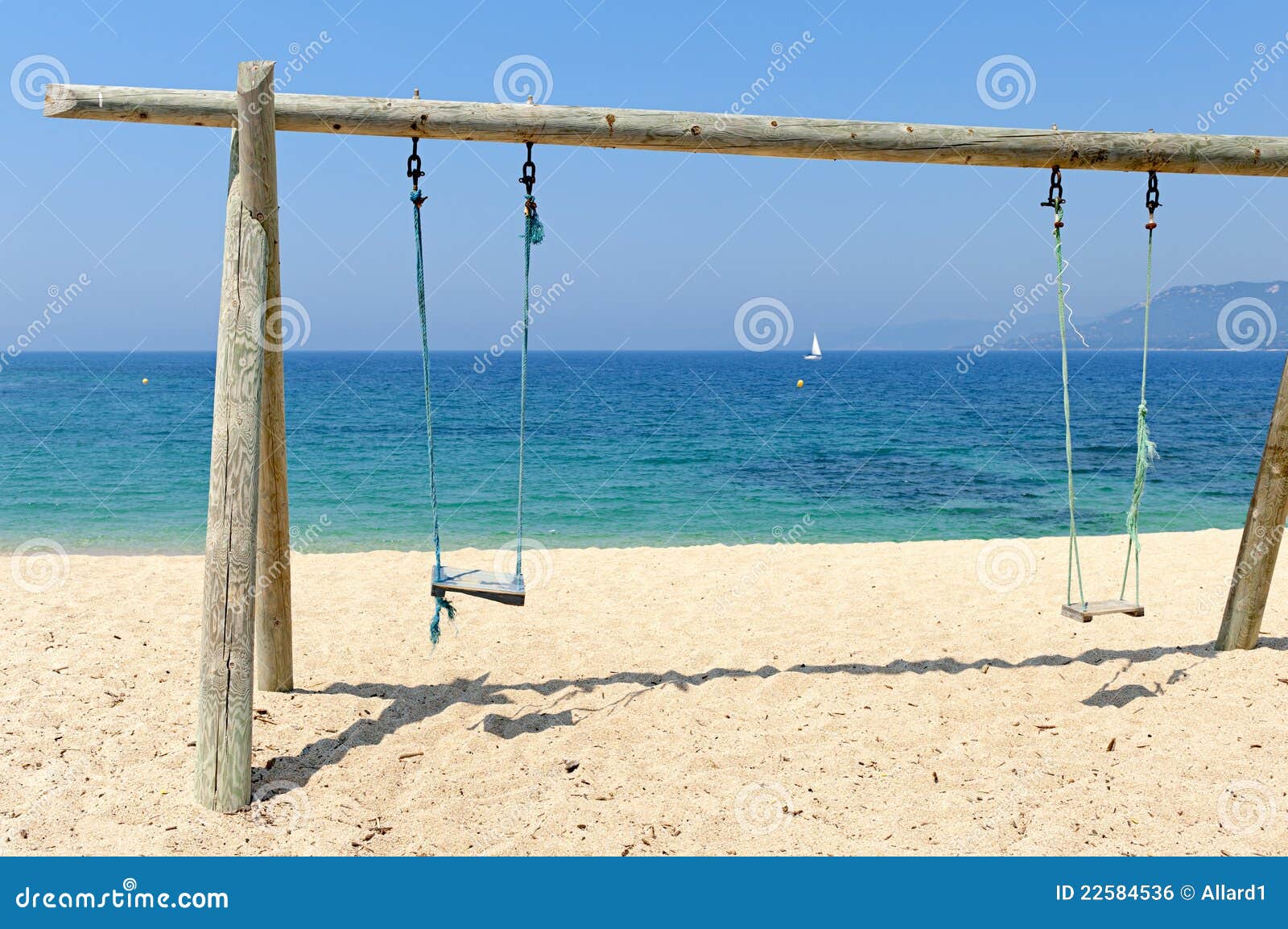 Double Swing on Beach by the Sea Stock Photo - Image of swing, edge ...