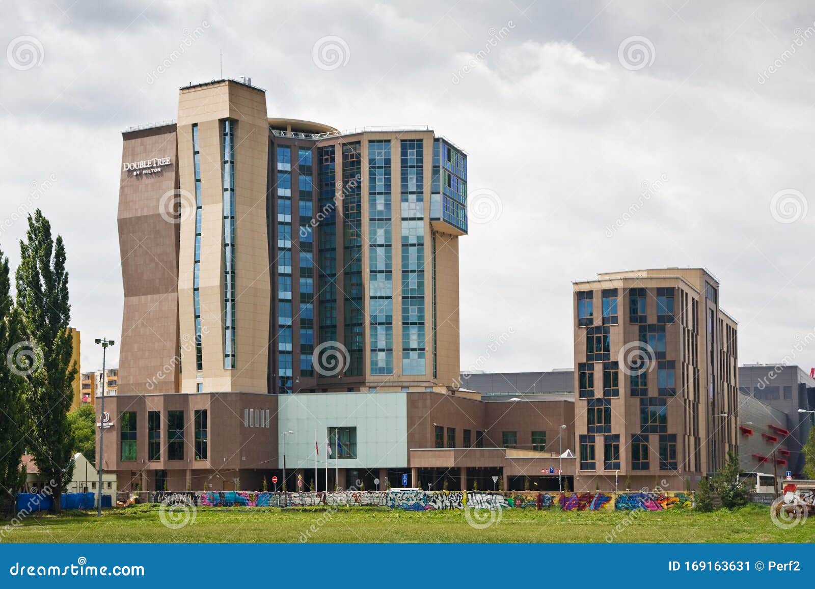 Double tree editorial photo. Image of modern, tree, building - 169163631