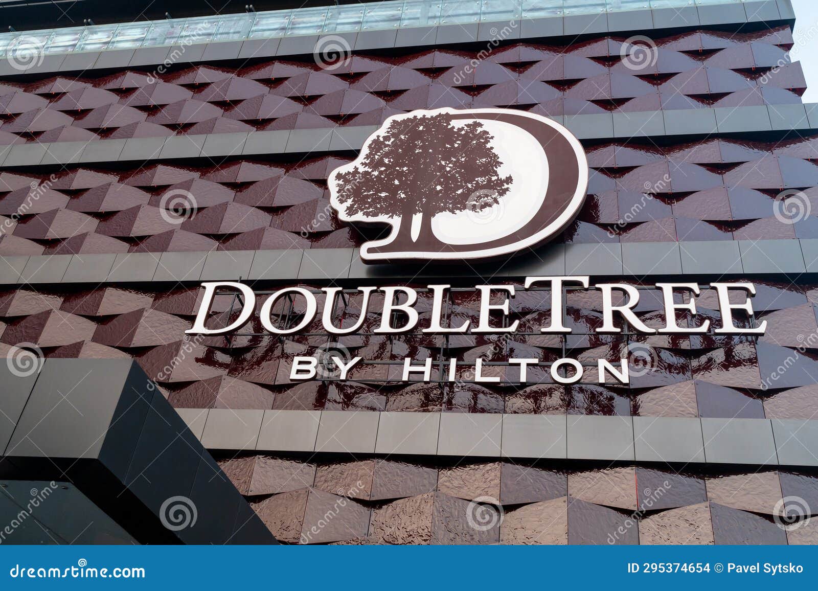 Double Tree Hilton Hotel. Logo on the Facade of the Hotel Building ...