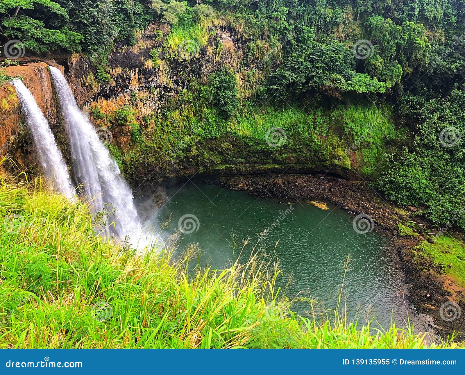 Double waterfall in Kauai stock image. Image of landscape - 139135955