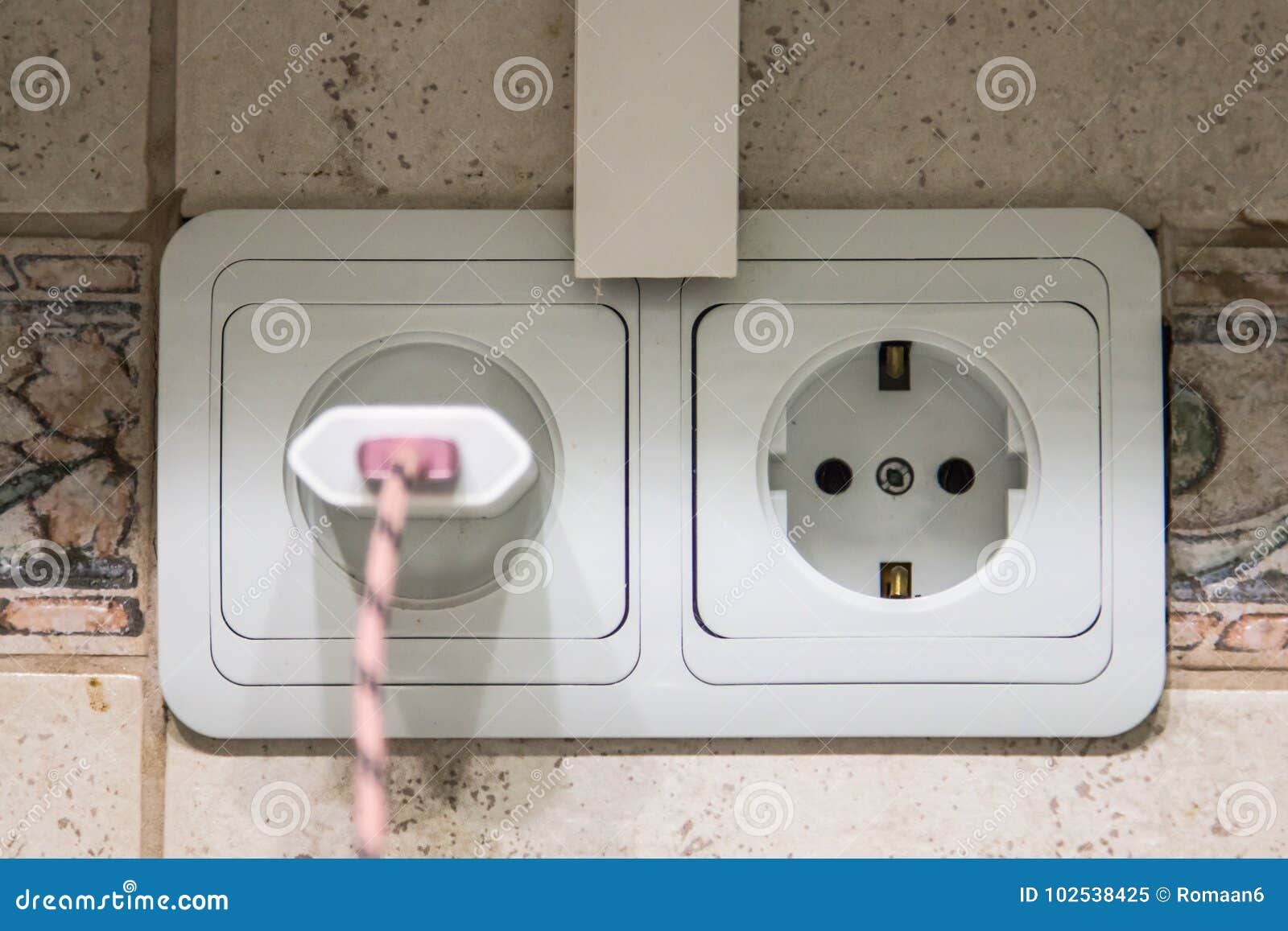 White Outlet On Brick Wall With Light Glass Blocks Royalty-Free Stock ...