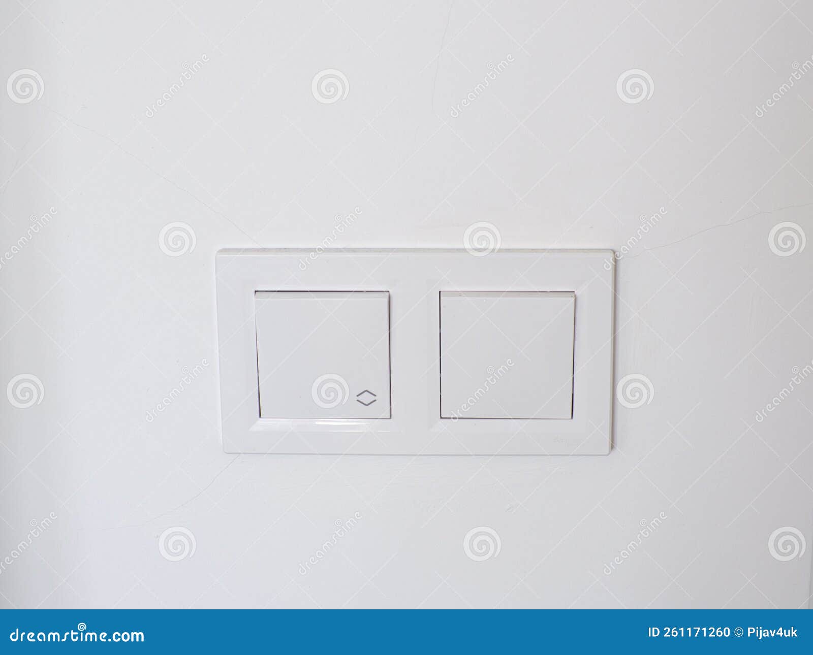 Double White Plastic Mechanical Switches, Installed on a White Wall ...