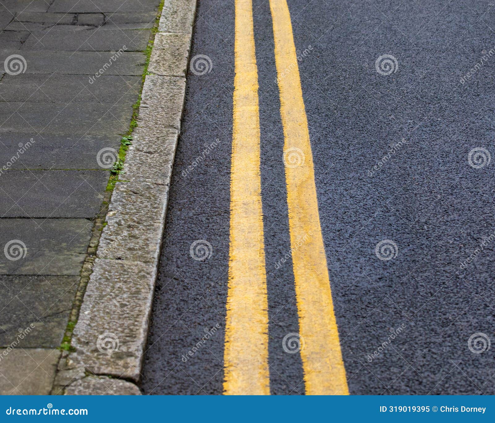 Double Yellow Lines stock image. Image of double, yellow - 319019395