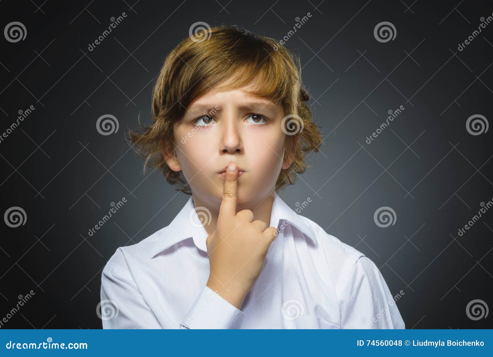 Doubt, Expression and People Concept - Boy Thinking Over Gray ...