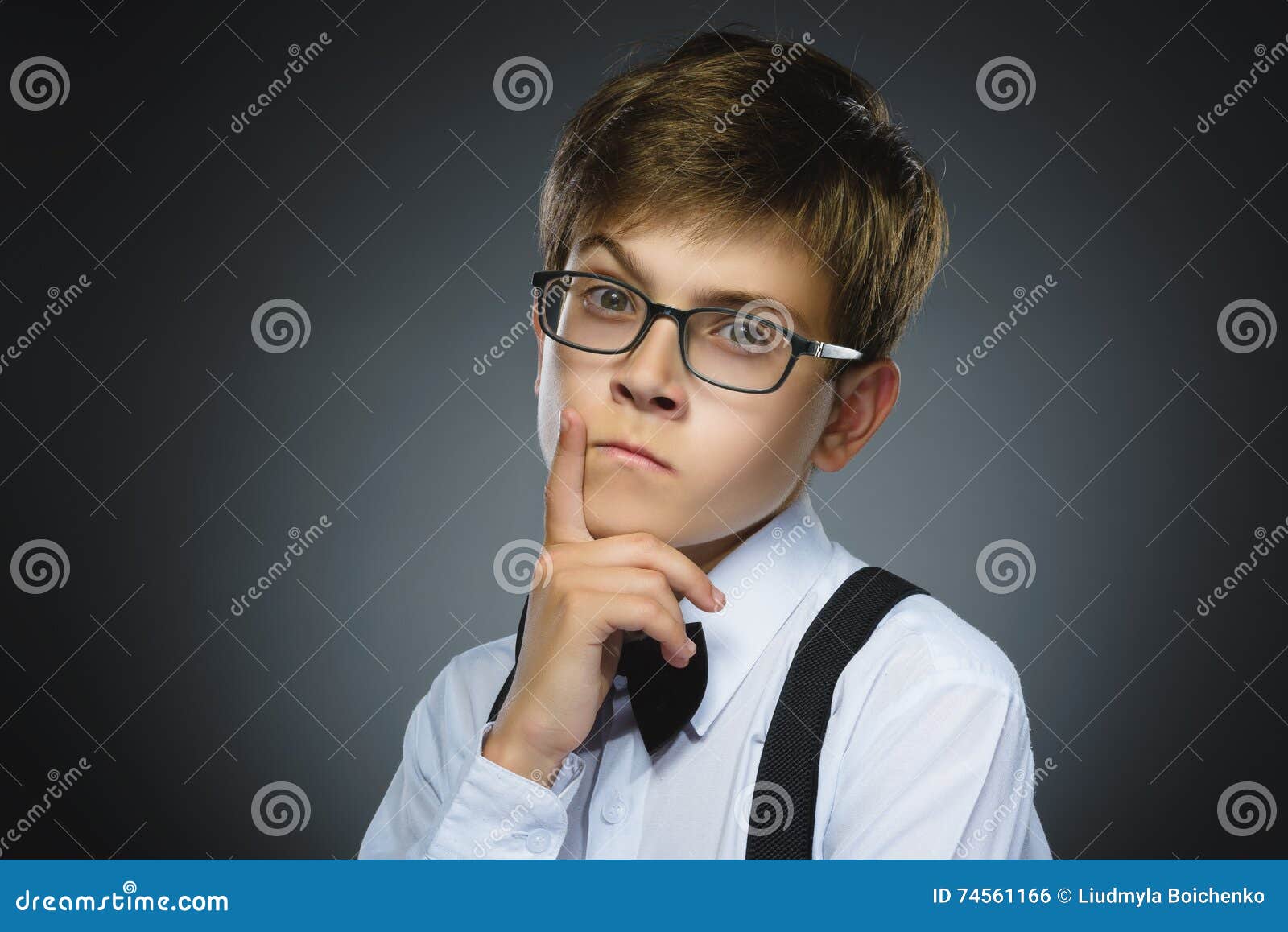 Doubt, Expression and People Concept - Boy Thinking Over Gray ...