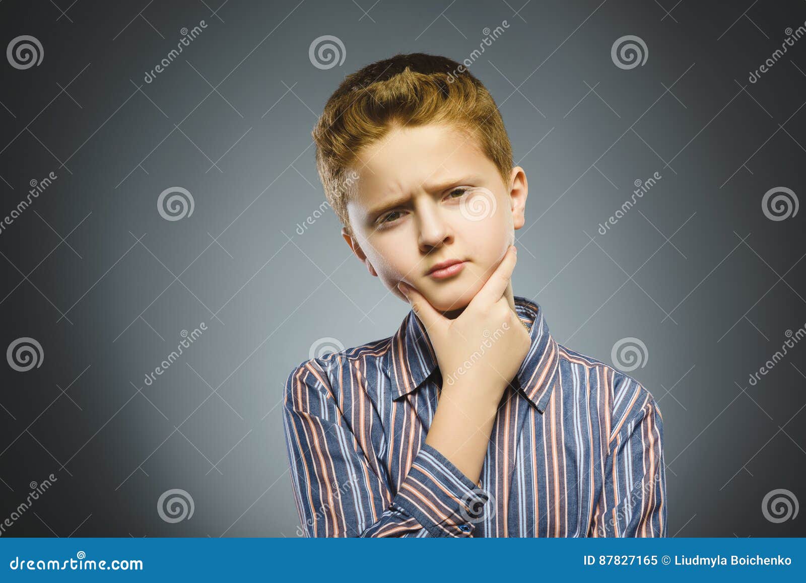 Doubt, Expression and People Concept - Boy Thinking Over Gray ...